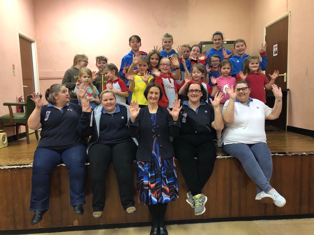 200207 Guides 7th Llanelli doing sign language – Nia Griffith MP